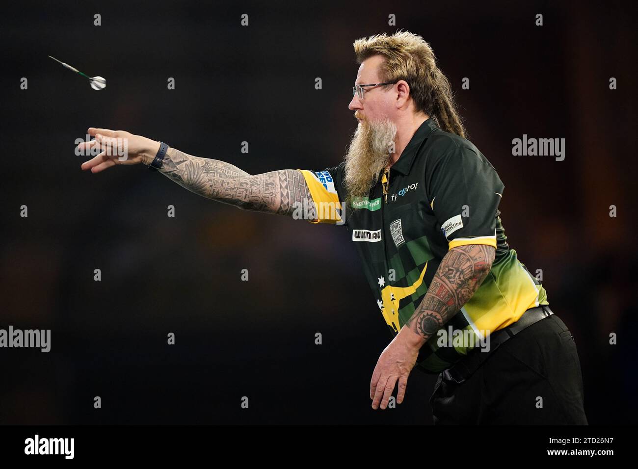 Simon Whitlock in action against Paolo Nebrida (not pictured) on day ...