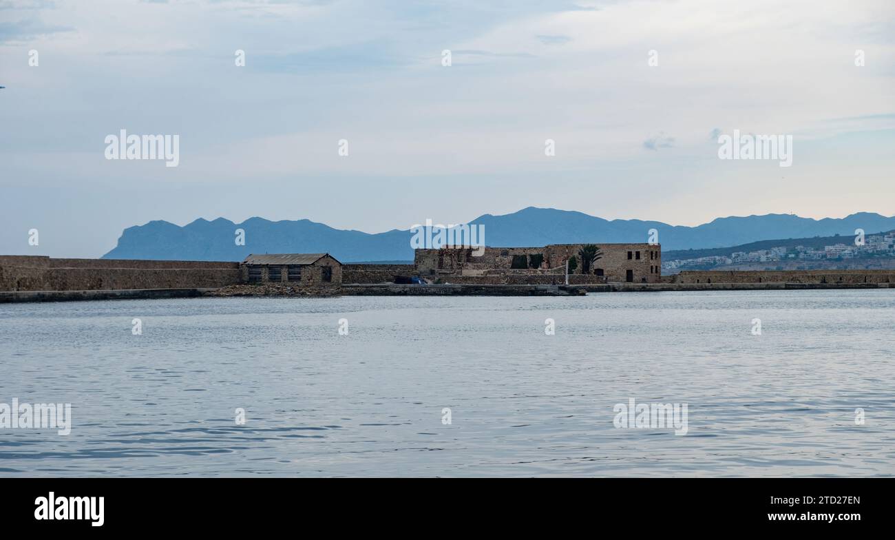 Stonewall breakwater at Venetian harbour, Old Town of Chania Crete ...