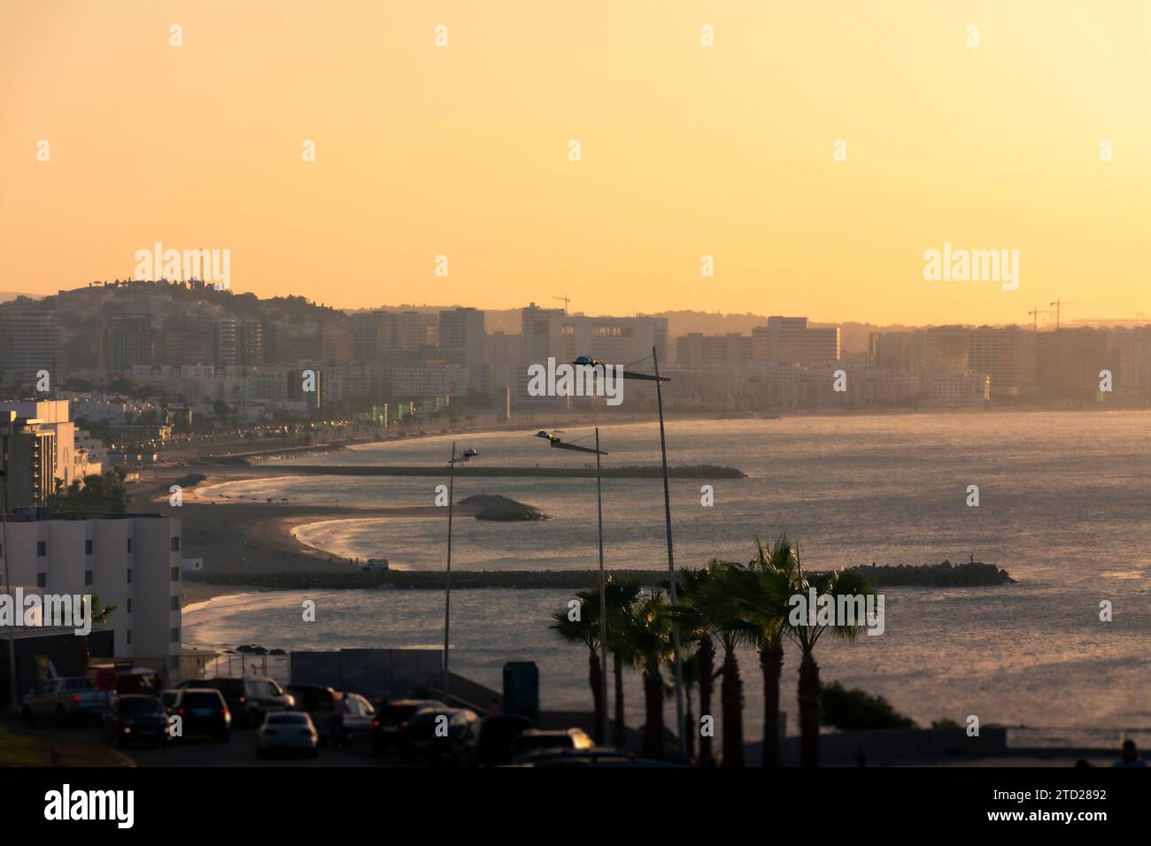 View of the city of Tangier, Ghandouri beach with the breakwaters, at ...
