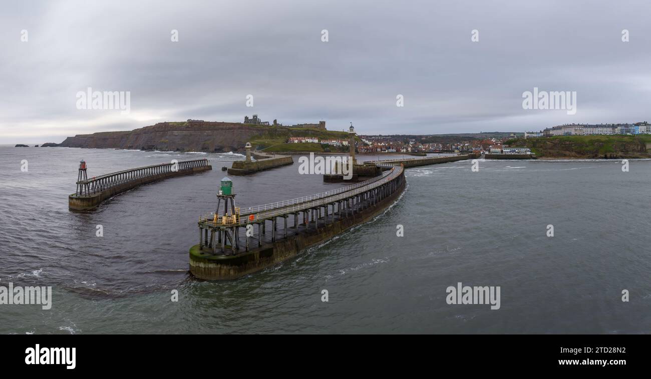 Whitby, North Yorkshire. Aerial View of the town and harbour featuring ...