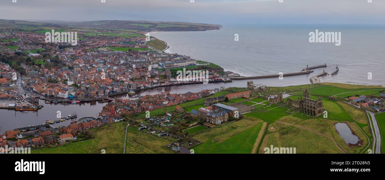 Whitby, North Yorkshire. Aerial View of the town and harbour featuring ...