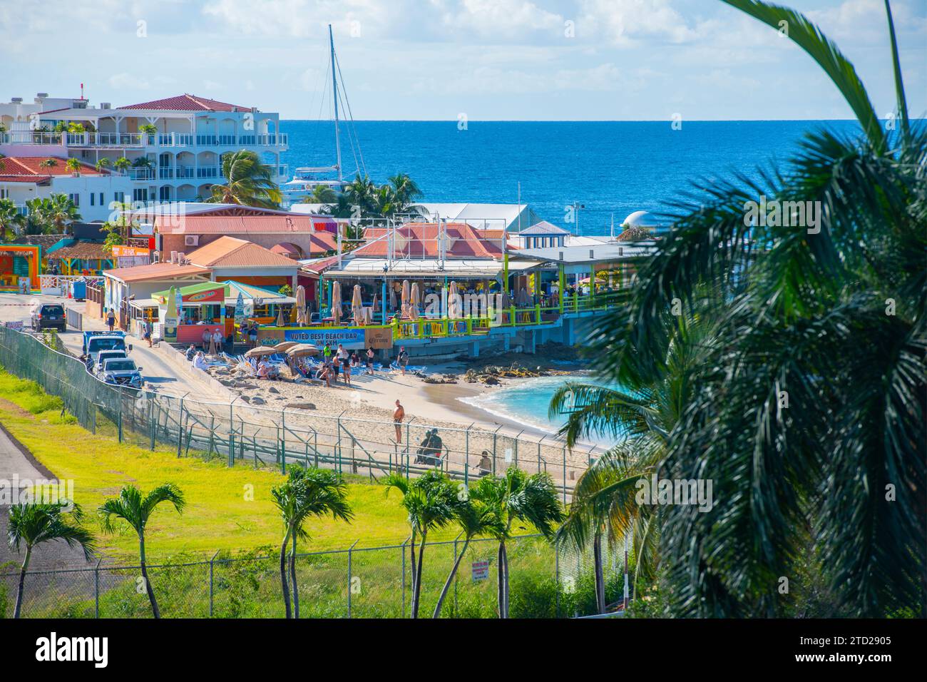 Maho Beach aerial view with people waiting for airplane landing on ...