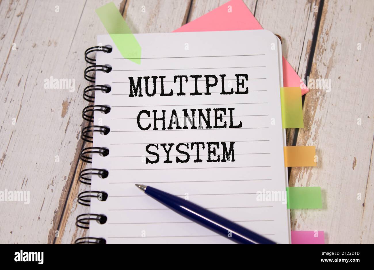 text Multiple Channel System on white business noteboock, concept Stock ...