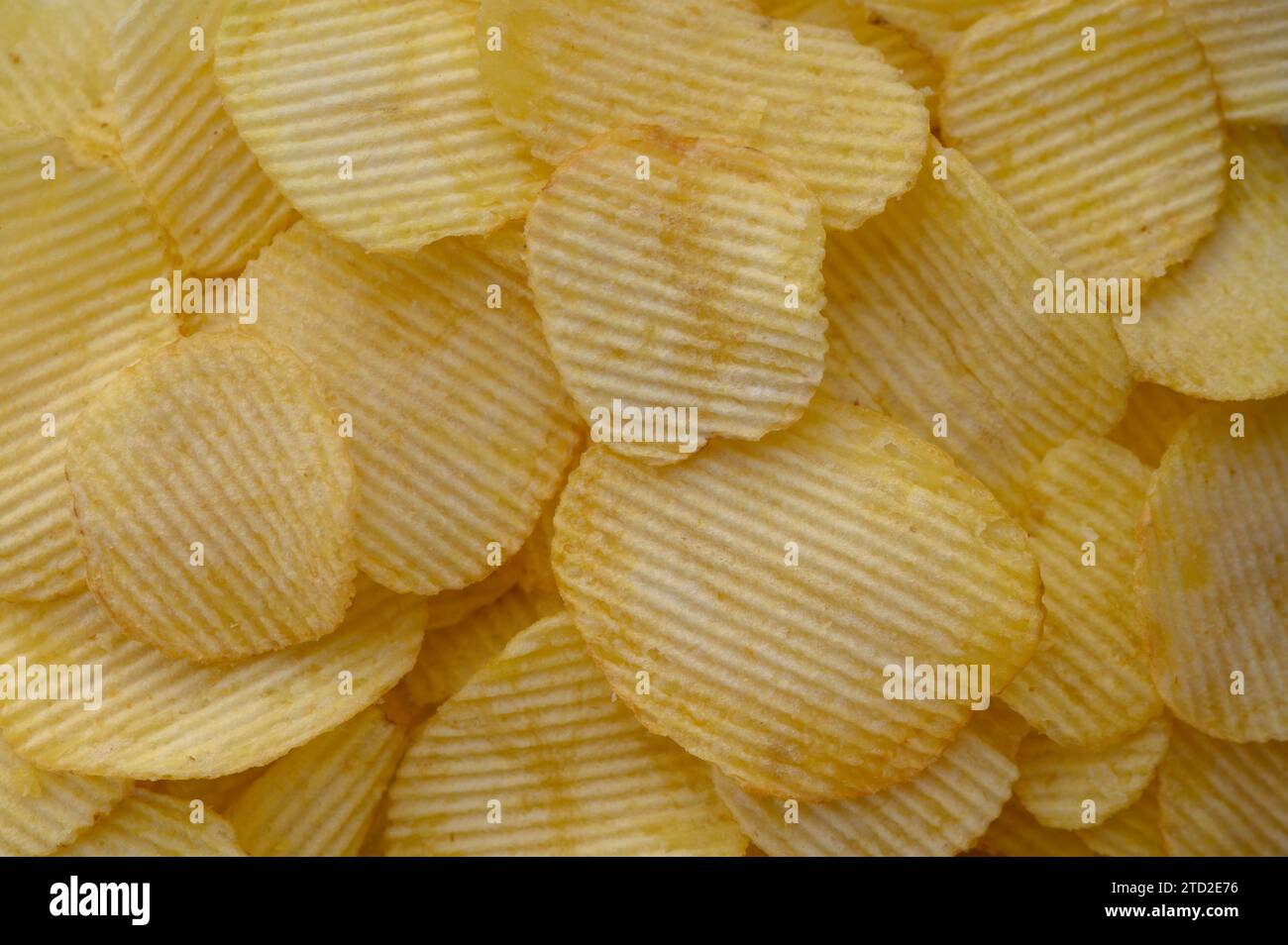 food background from delicious chips poured out of a pack 3 Stock Photo ...