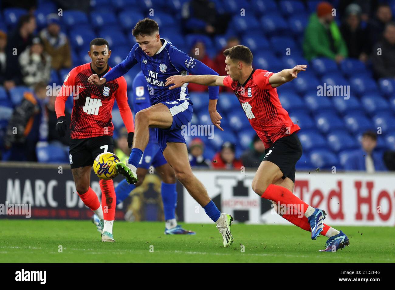 Rubin Colwill of Cardiff City (c) & Krystian Bielik of Birmingham City ...