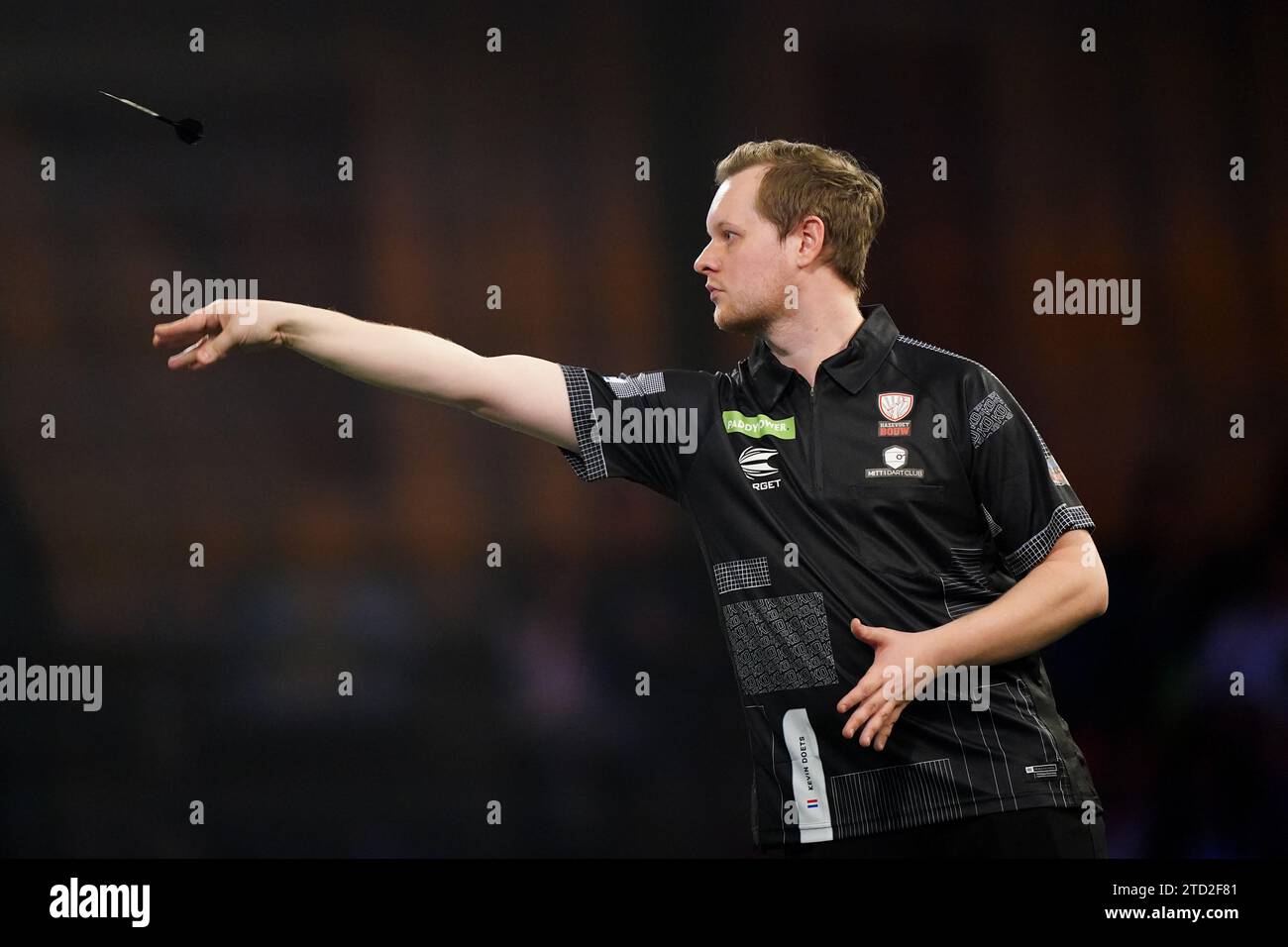 Kevin Doets in action against Michael Smith (not pictured) on day one ...