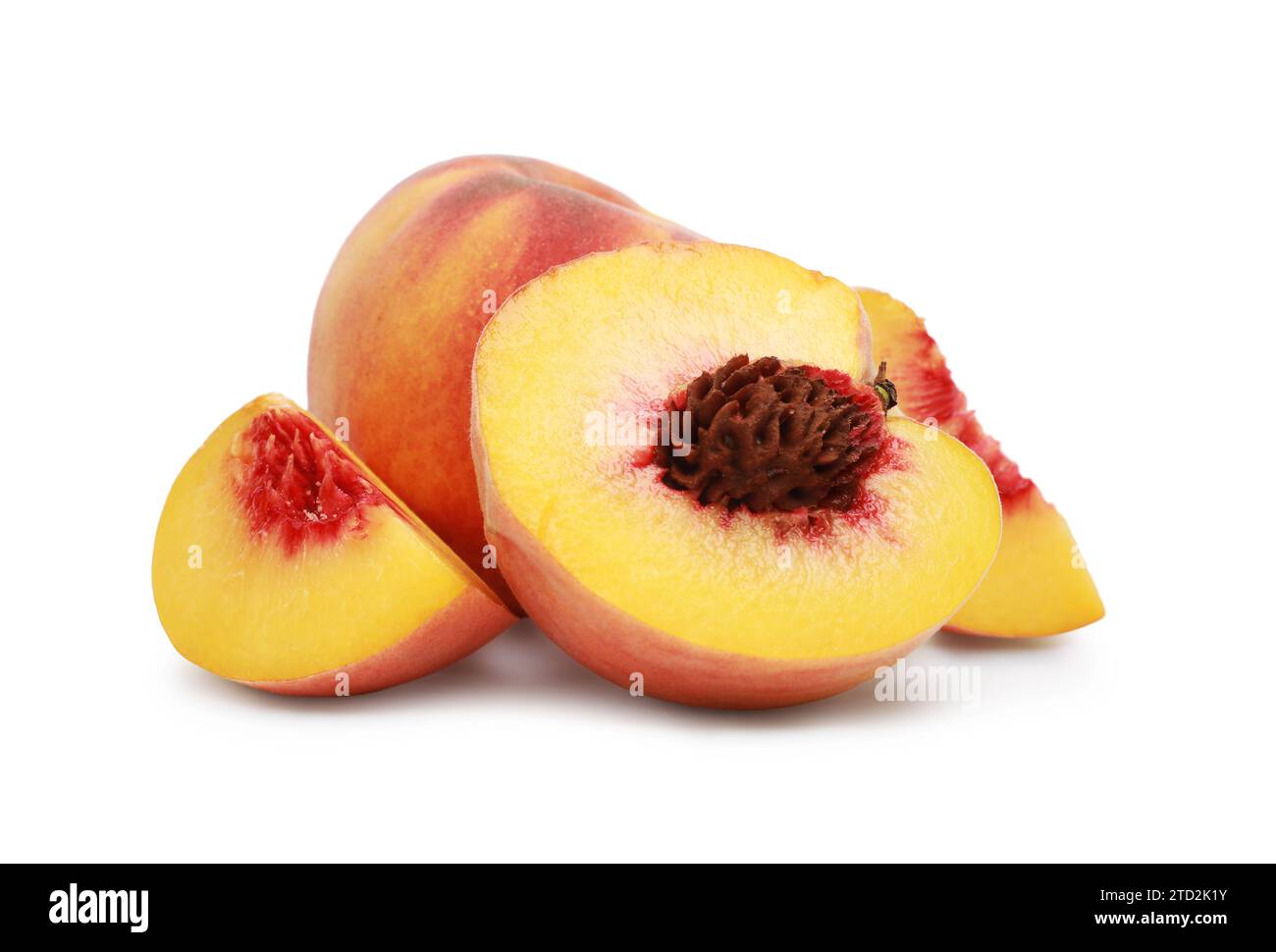 Whole and cut delicious peaches isolated on white Stock Photo - Alamy