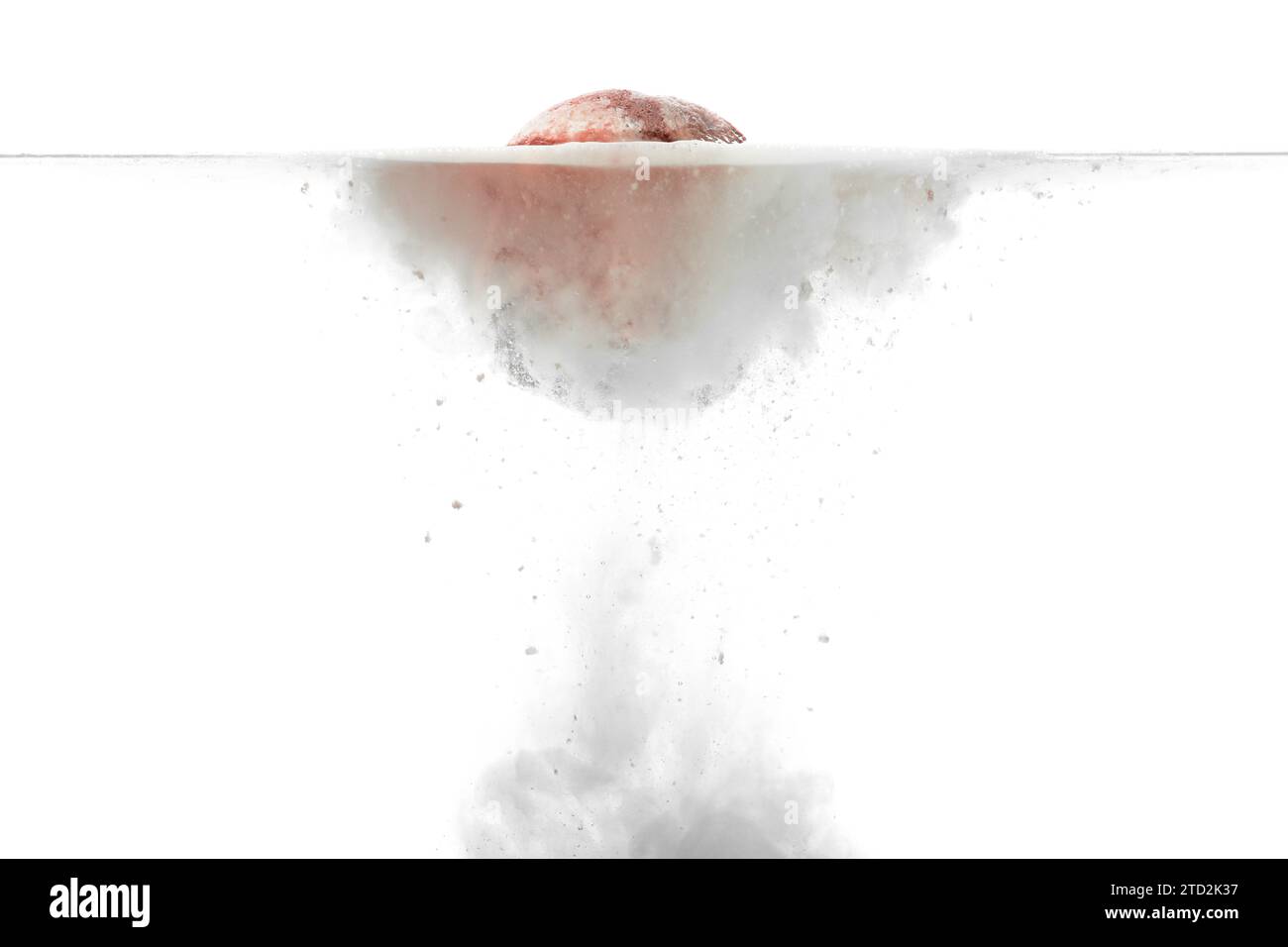 Bath bomb in water on white background Stock Photo - Alamy
