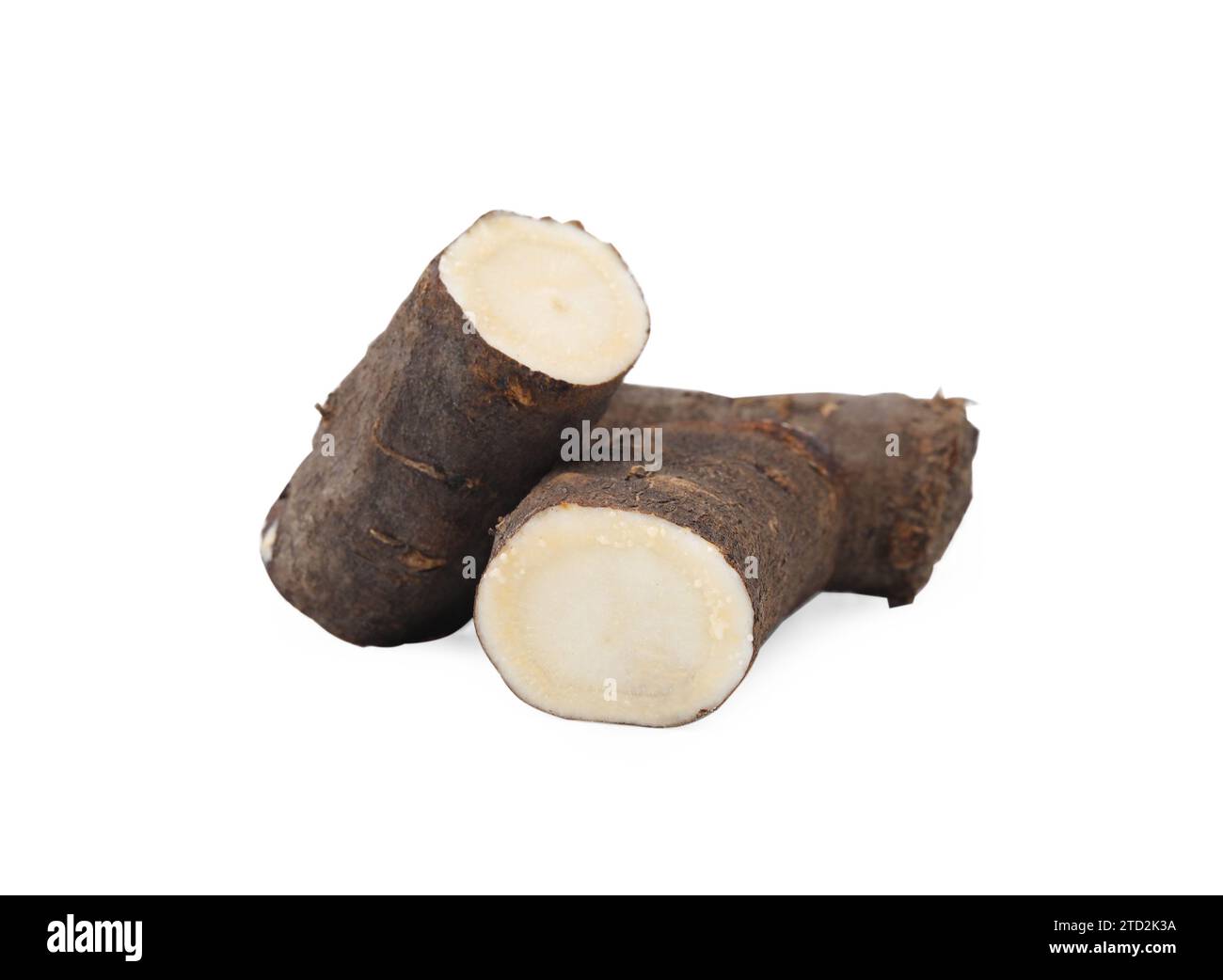 Cut raw salsify roots on white background Stock Photo - Alamy