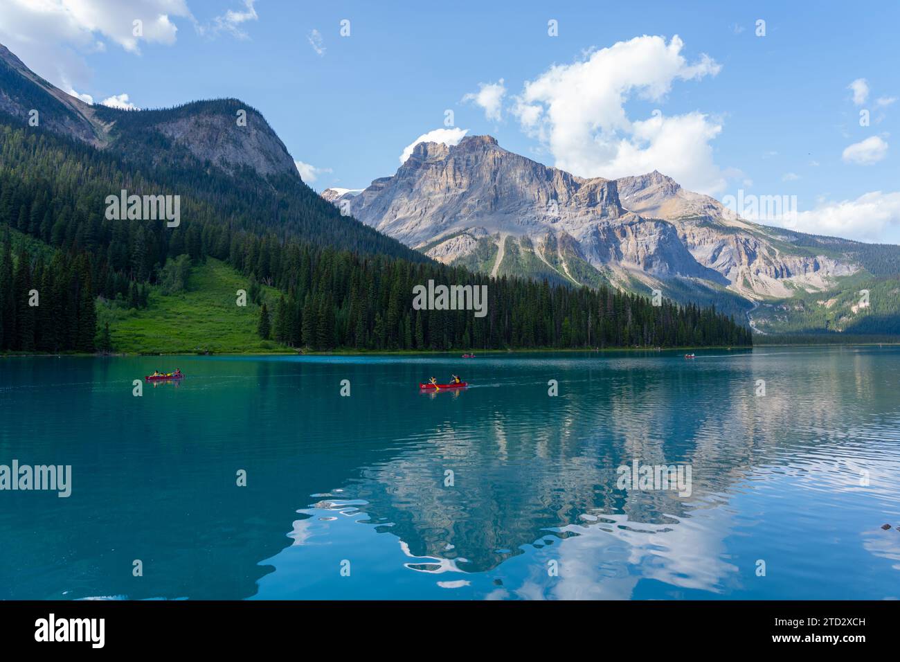 People canoeing in Emerald Lake in Yoho National Park, British Columbia ...
