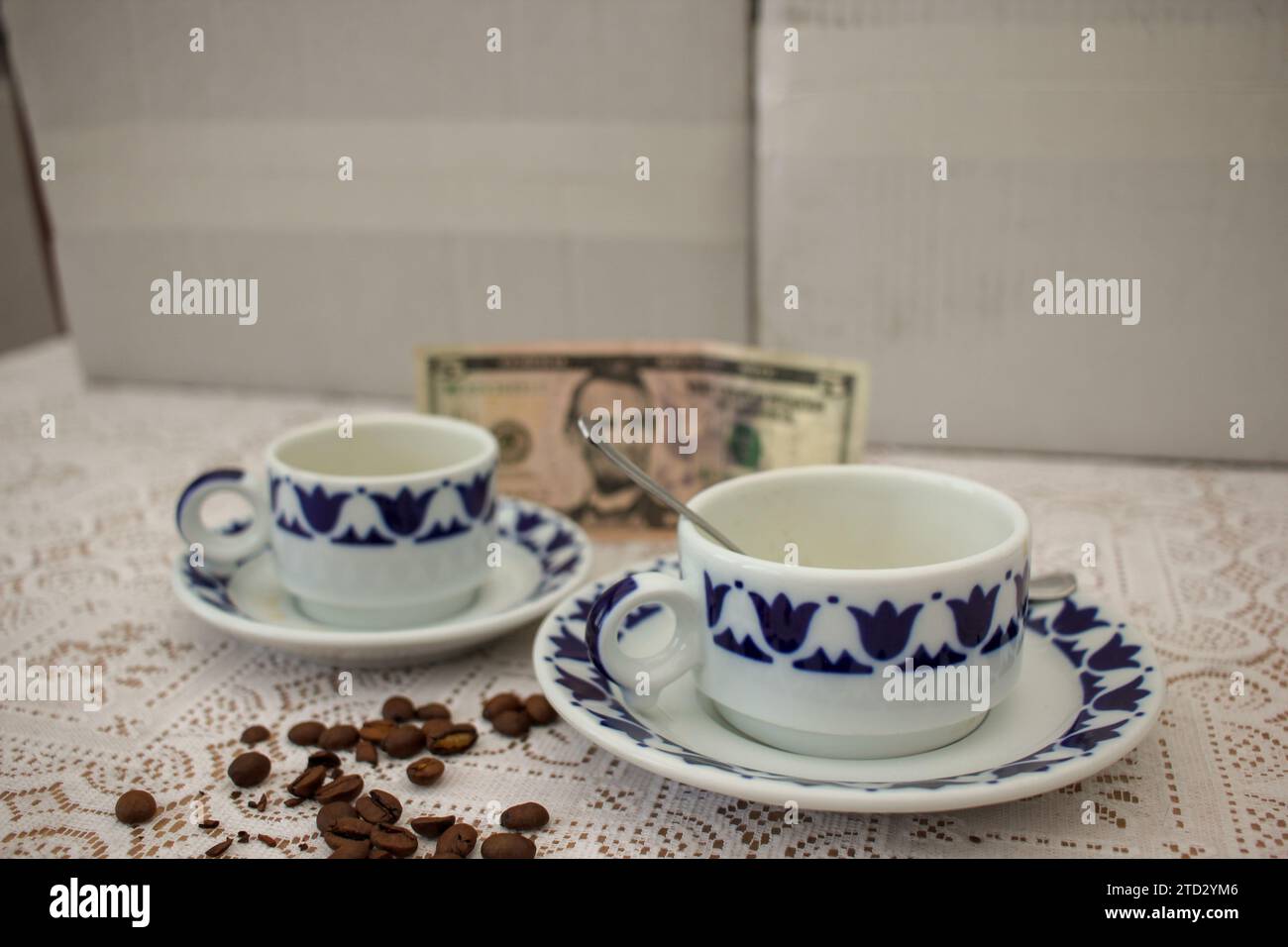 Caffeine Costs: Coffee Cups Amidst Expensive Coffee Beans Stock Photo ...