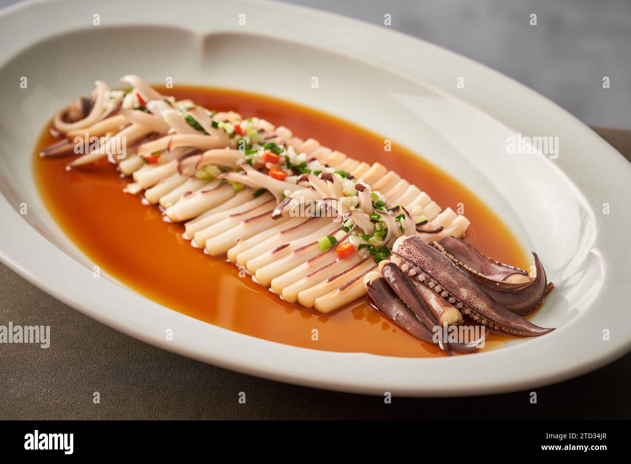 Steamed Baby Cuttlefish （baby Squid） spicy Sauce Stock Photo - Alamy