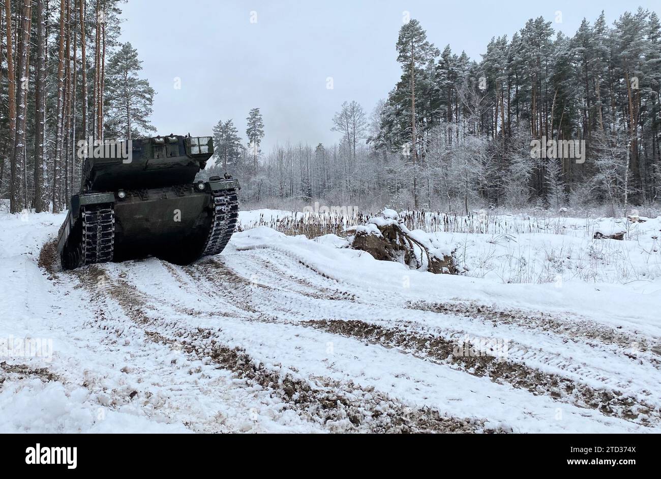 15 December 2023, Lithuania, Rukla: A Leopard 2 A6 tank drives at the ...