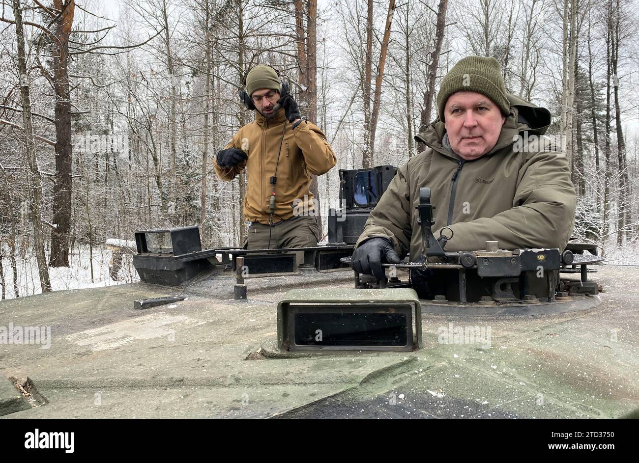 15 December 2023, Lithuania, Rukla: Arvydas Anusauskas (r), Minister of ...