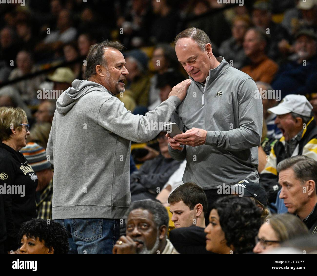 December 15, 2023: A Colorado fan chats with Colorado Athletic Director ...