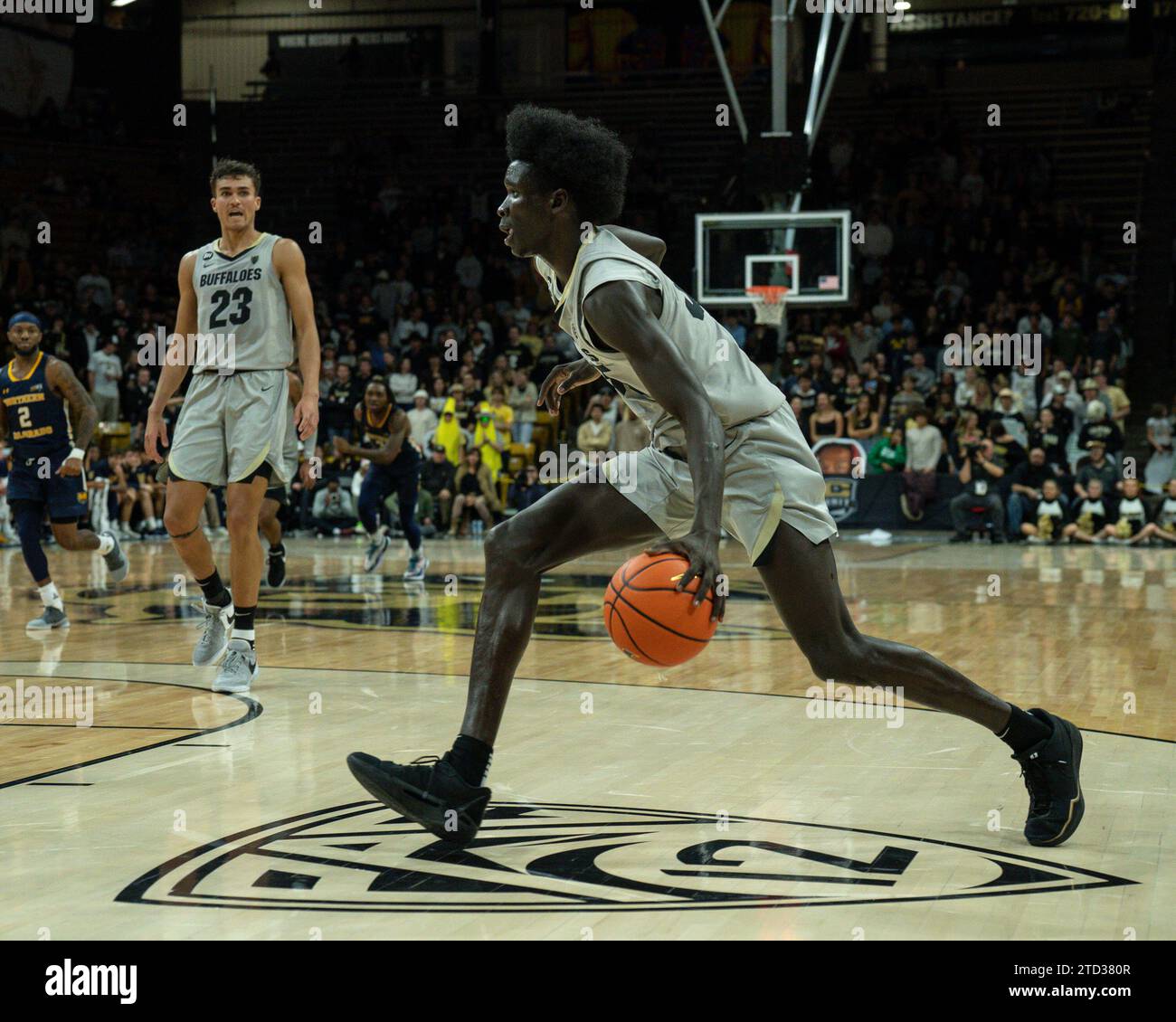 December 15, 2023: Colorado Buffaloes forward Assane Diop (35) drives ...