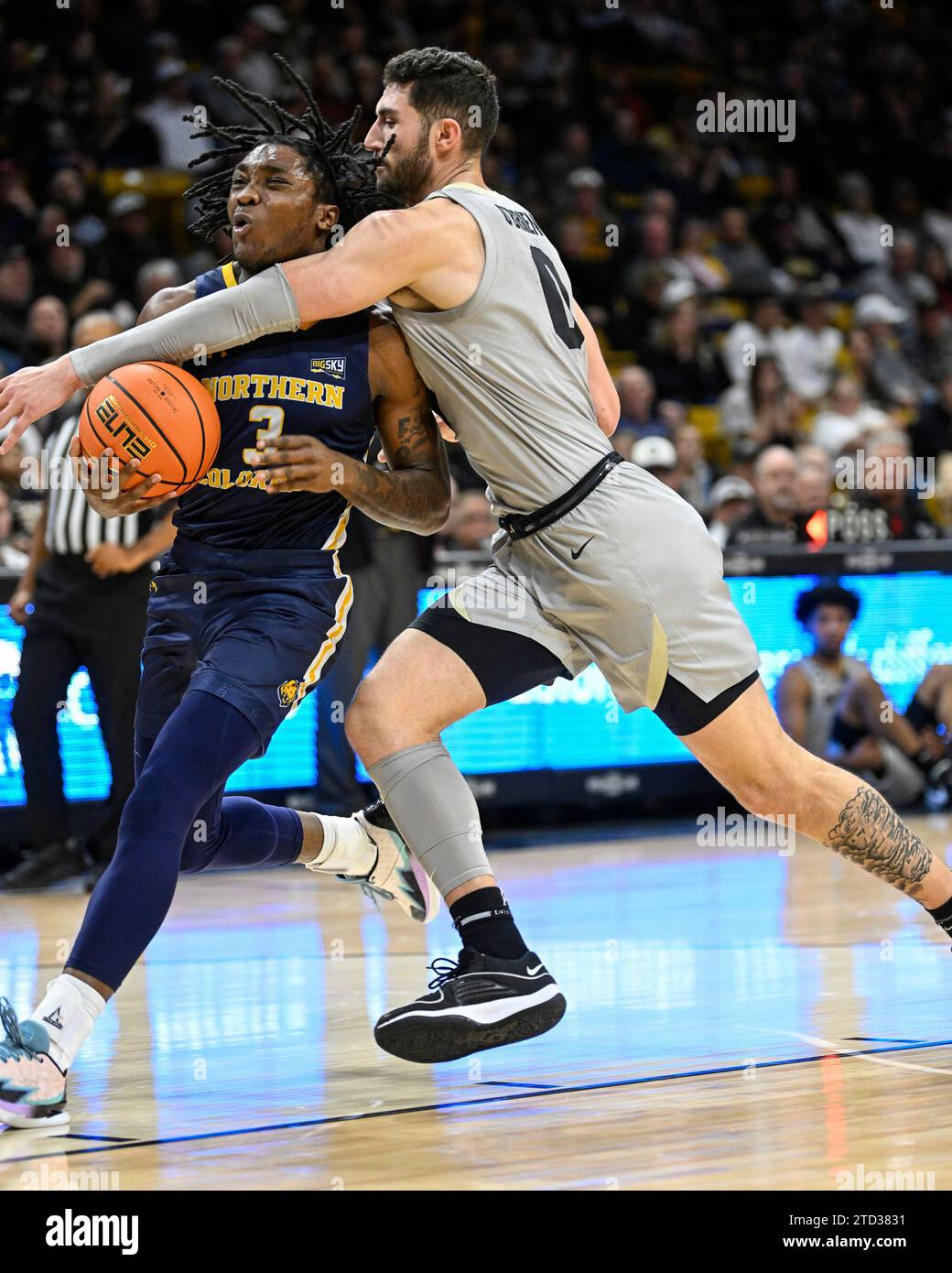 December 15, 2023: Colorado Buffaloes guard Luke O'Brien (0) fouls ...