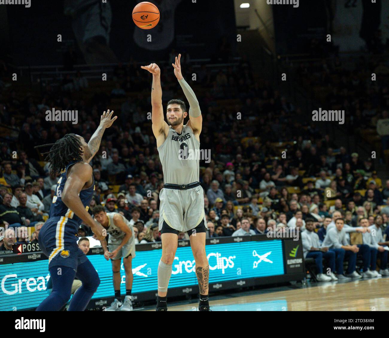 December 15, 2023: Colorado Buffaloes guard Luke O'Brien (0) shoots a ...