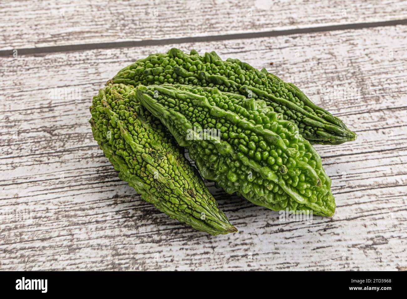 Green raw bitter lemon vegetables heap Stock Photo - Alamy
