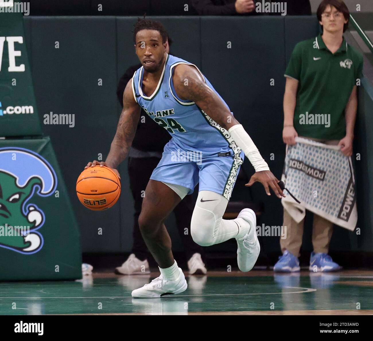 Tulane Green Wave forward Kevin Cross (24) brings the ball up the court ...
