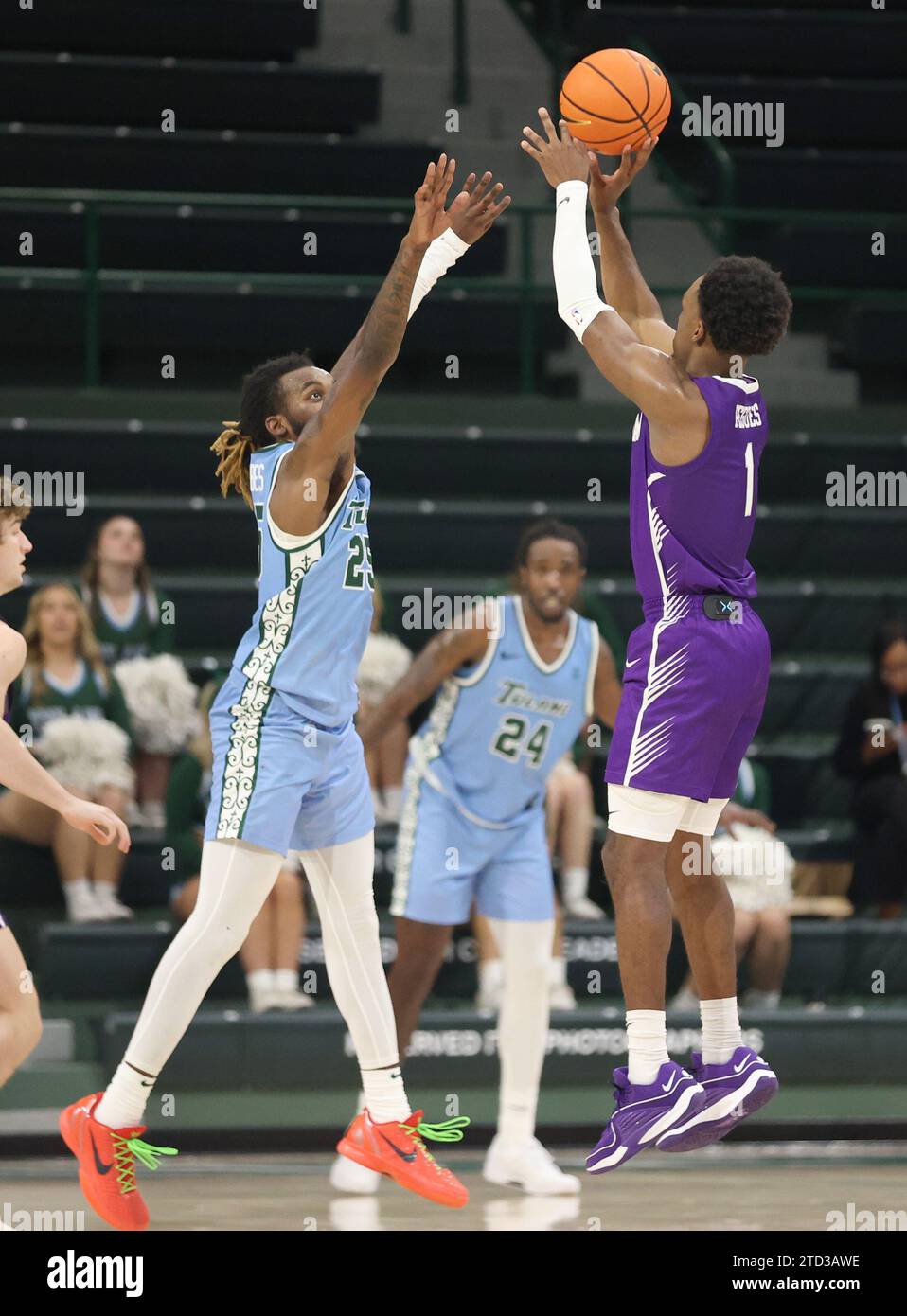 Furman Paladins guard JP Pegues (1) shoots a three-pointer over Tulane ...