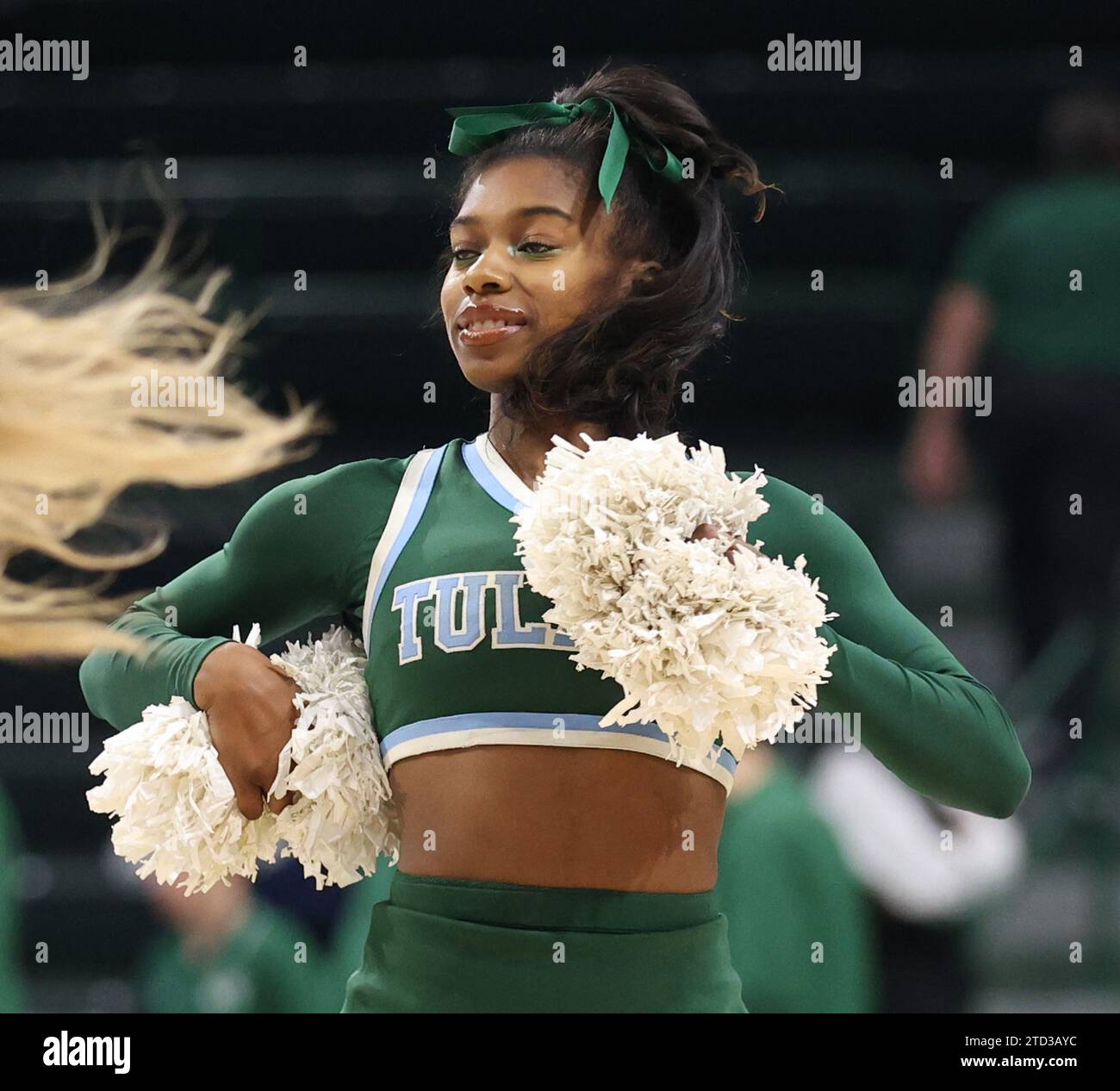 The Tulane Green Wave cheerleaders perform during a men’s basketball ...