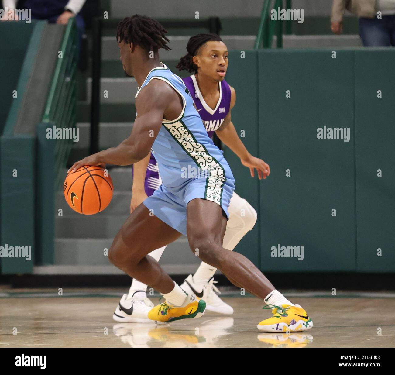 Tulane Green Wave guard Sion James (1) tries to get past Furman ...