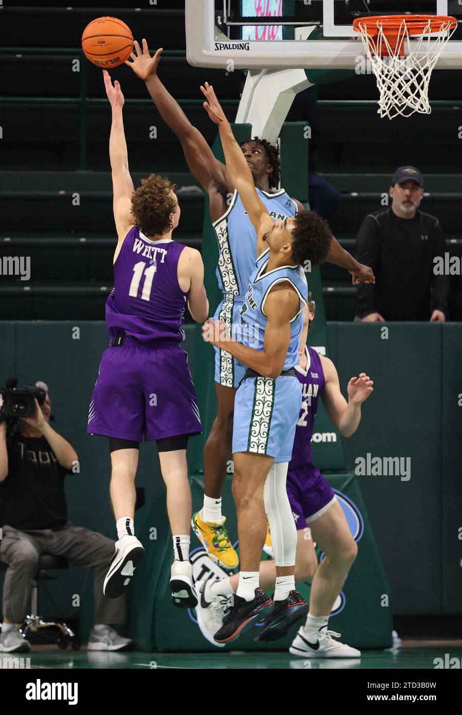 Tulane Green Wave guard Sion James (1) tries to block Furman Paladins ...
