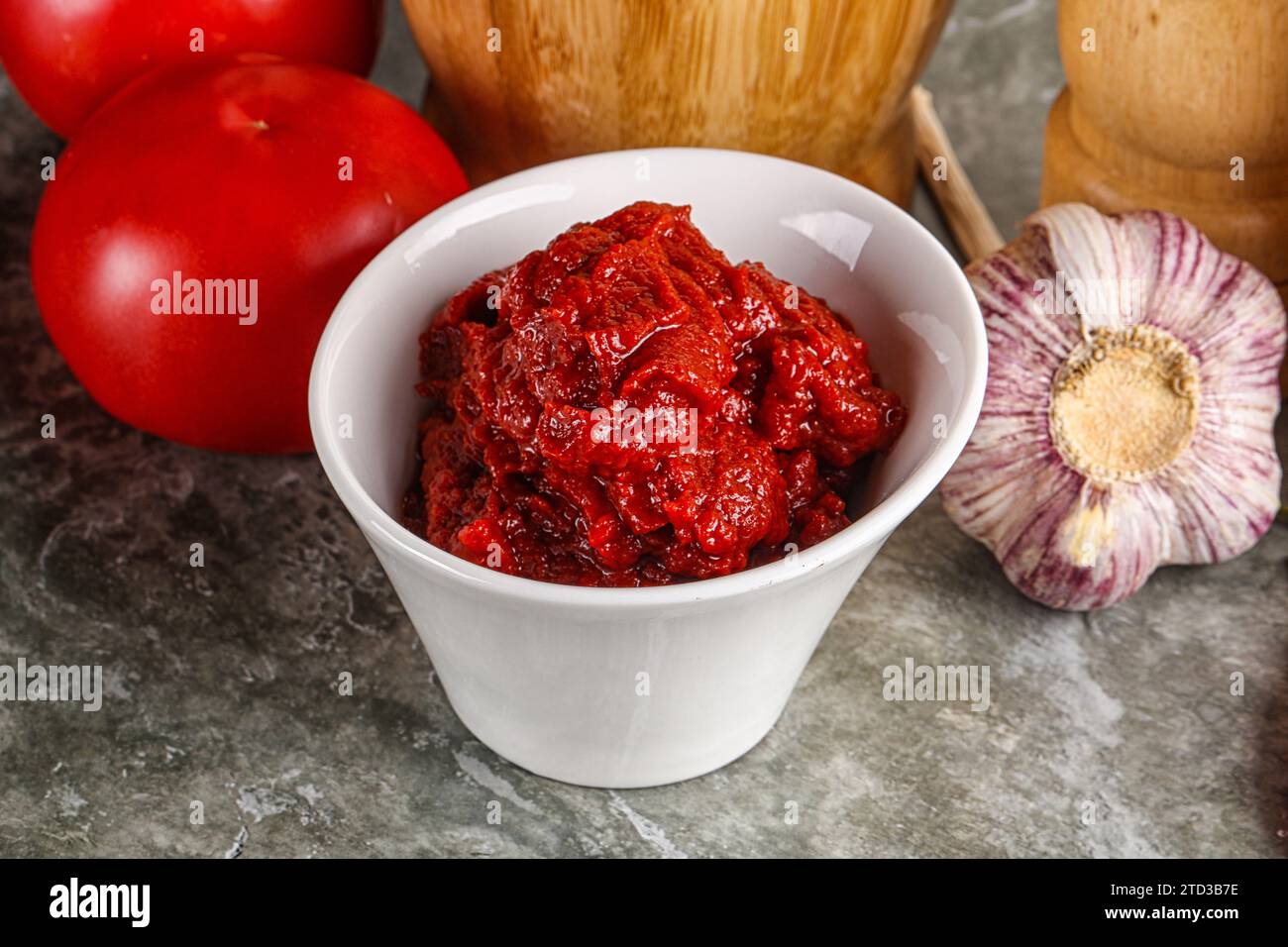 Natural organic red tomato paste in the bowl Stock Photo - Alamy