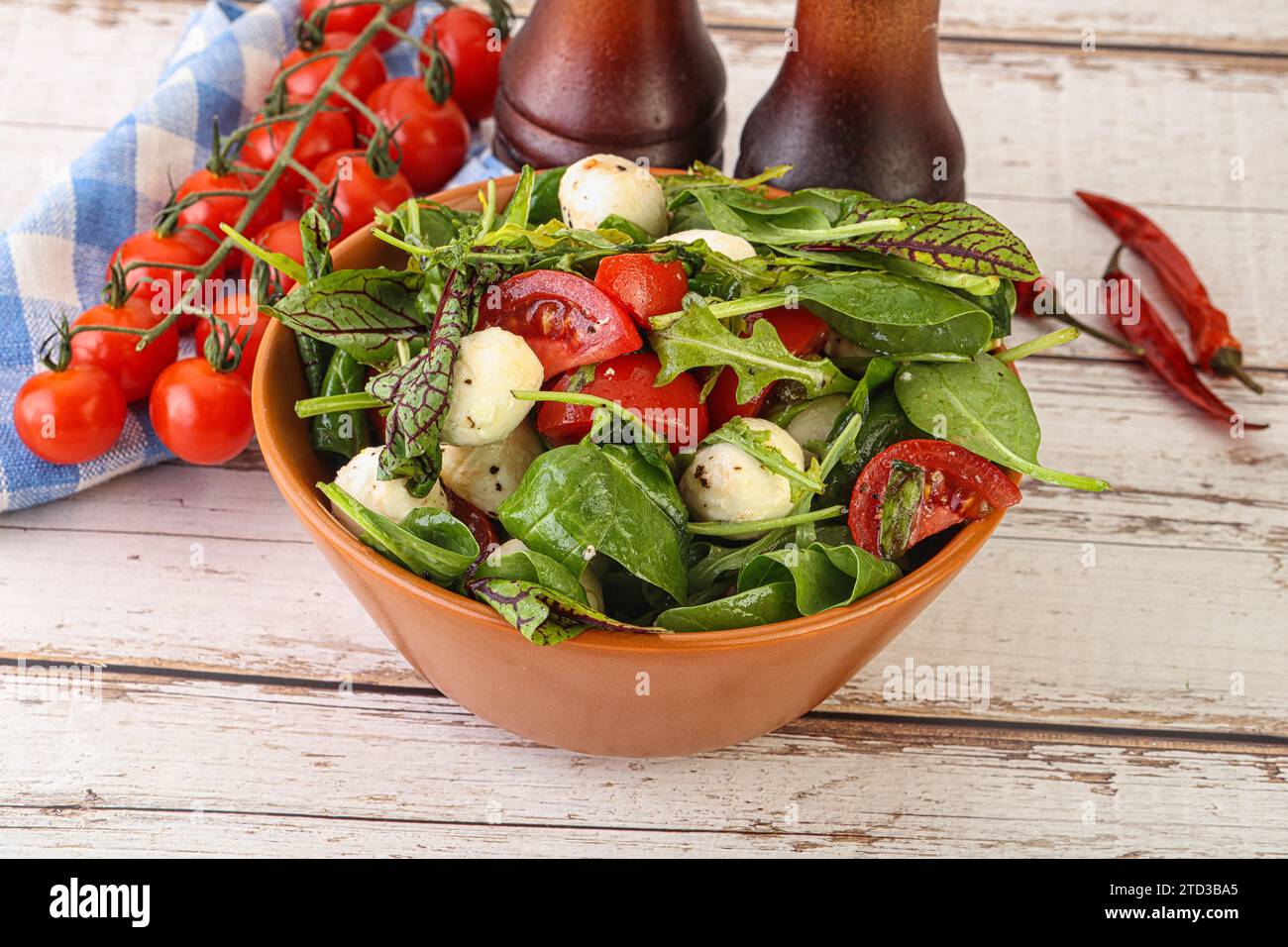 Mix salad with mini mozzarella and tomato Stock Photo - Alamy