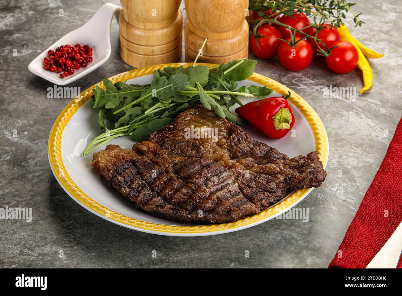 Grilled chuck roll beef steak with arugula Stock Photo - Alamy
