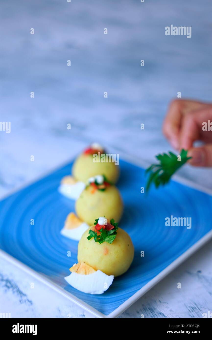 Typical Peruvian dish called causa rellena, which is served as a ...