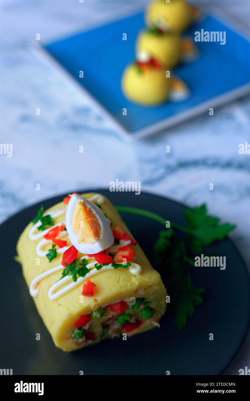 Typical Peruvian dish called causa rellena, which is served as a ...