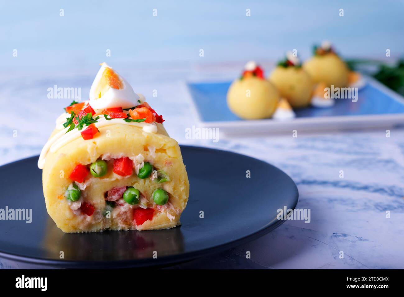 Typical Peruvian dish called causa rellena, which is served as a ...
