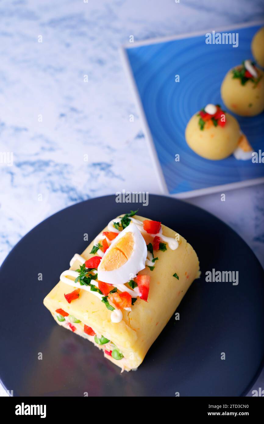 Typical Peruvian dish called causa rellena, which is served as a ...
