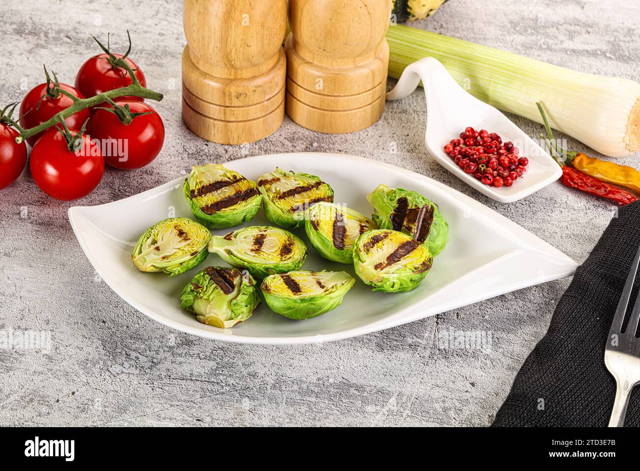 Vegan cuisine Grilled green brussel sprout cabbage Stock Photo - Alamy