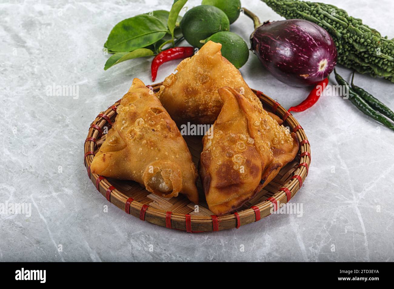 Indian cuisine - fries crispy stuffed samosa Stock Photo - Alamy