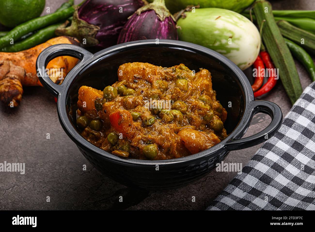 Indian traditional cuisine Aloo mutter - potato with green peas Stock ...