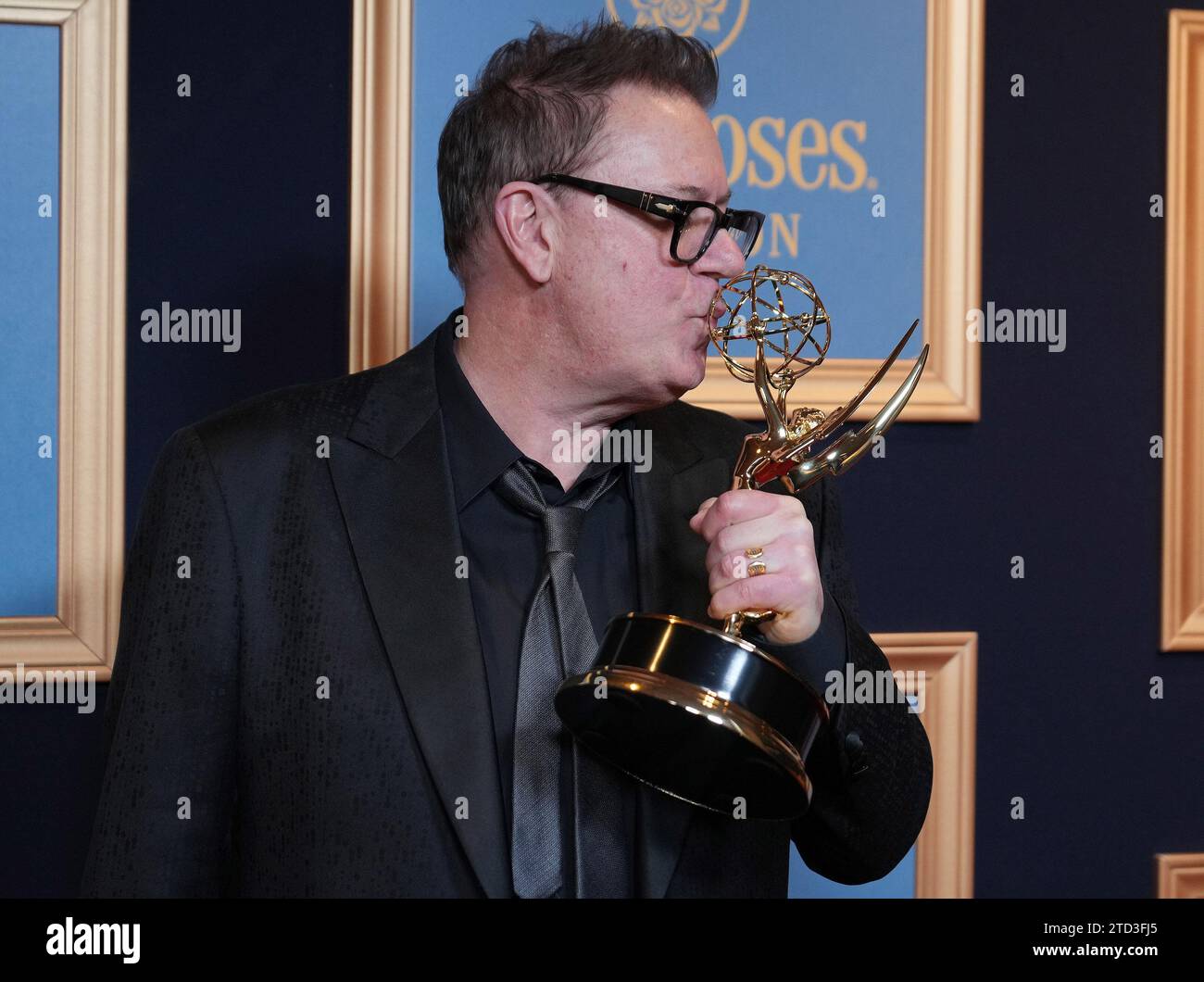 Josh Griffith poses with the award for outstanding writing team for a ...