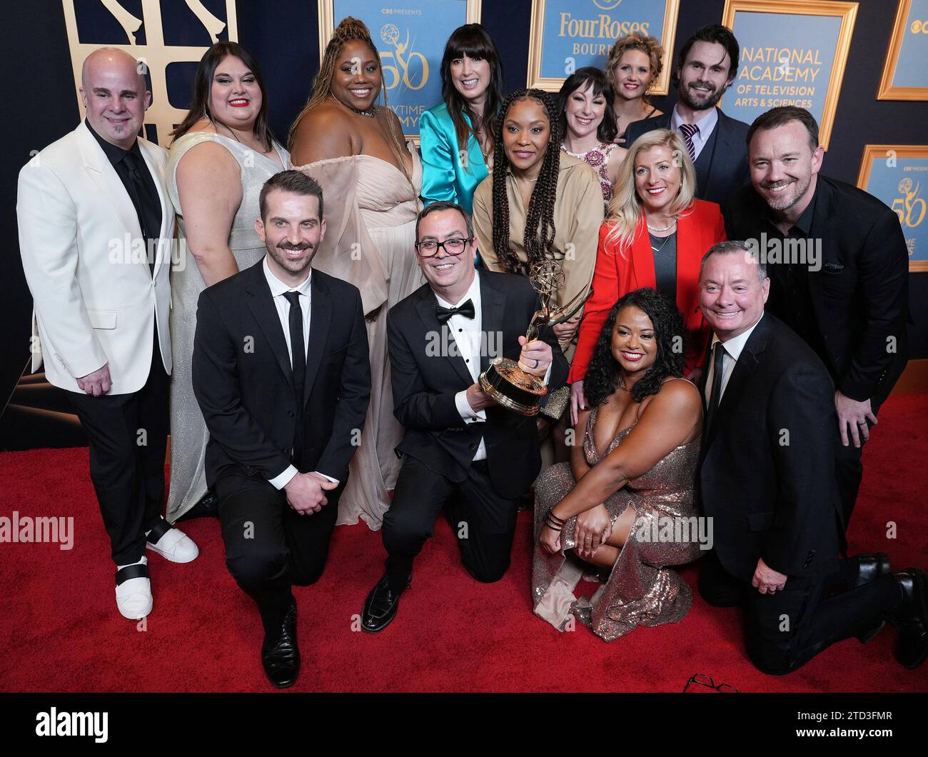 KELLY CLARKSON SHOW Team and Alex Duda (C) poses with the award for ...