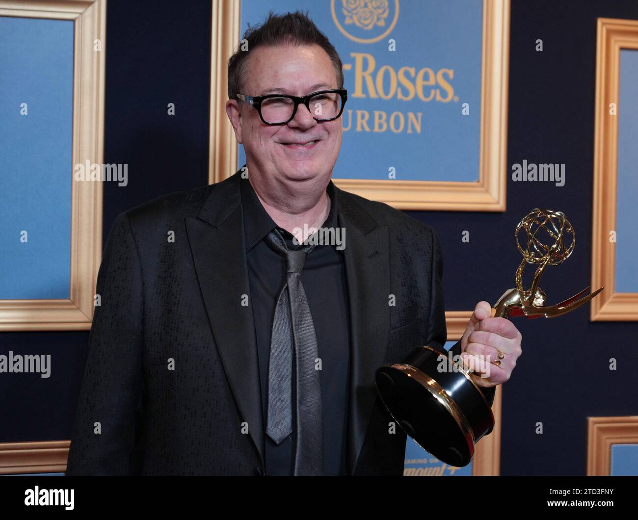 Josh Griffith poses with the award for outstanding writing team for a ...