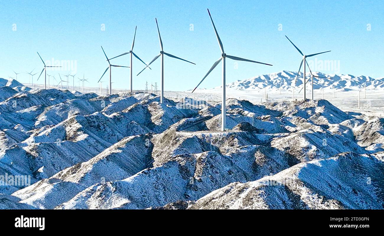 ZHANGYE, CHINA - DECEMBER 15, 2023 - Wind turbines are seen in snow in ...