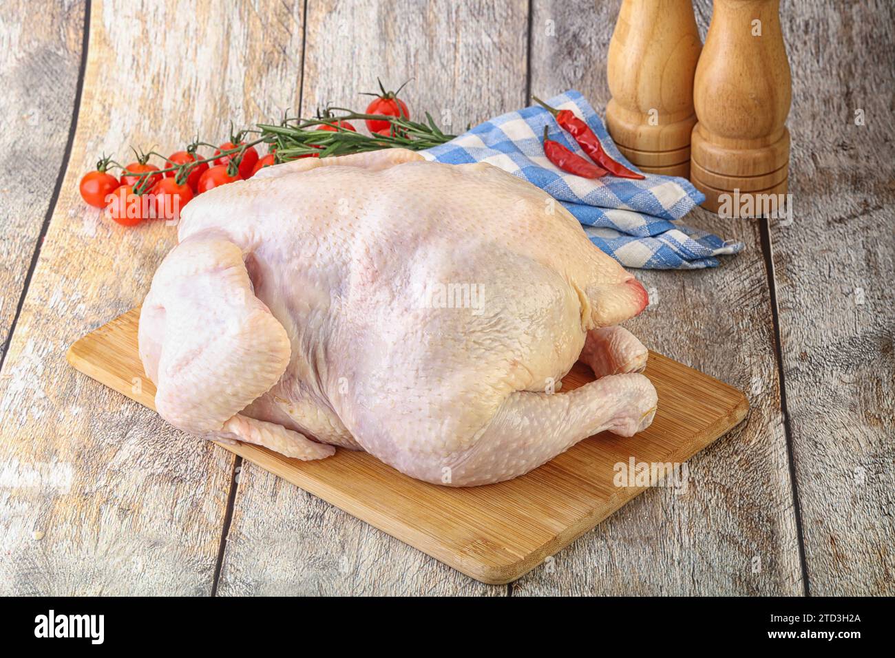 Whole big raw chicken for cooking Stock Photo - Alamy