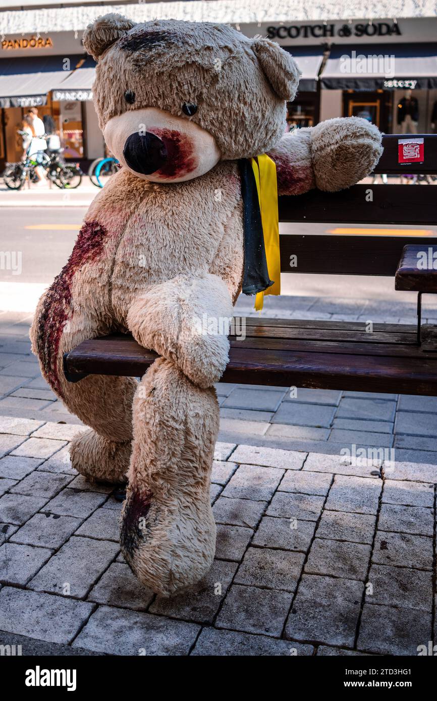 Tel Aviv, Israel - December 15, 2023 Bears sitting on a bench in memory ...