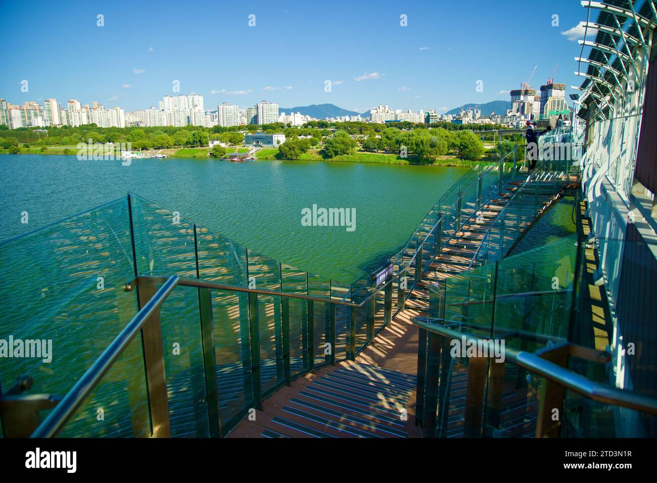 Seoul, South Korea - October 1, 2023: A descending walkway with a glass ...