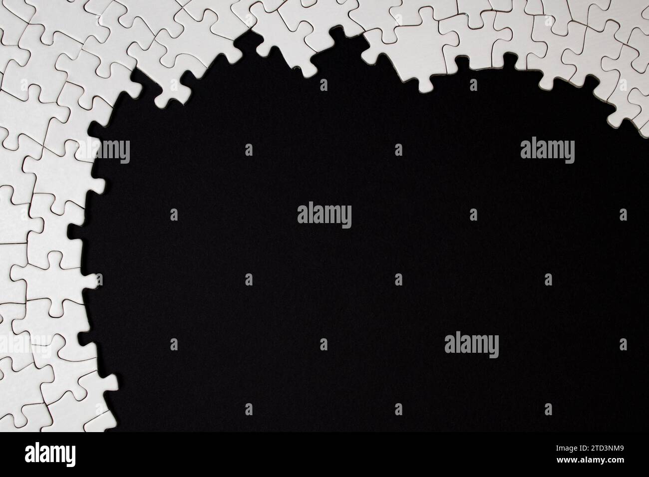 Plain white jigsaw puzzle frame on black color background Stock Photo ...