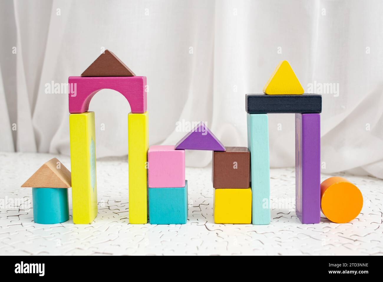 Colorful building blocks arches, on white background Stock Photo - Alamy