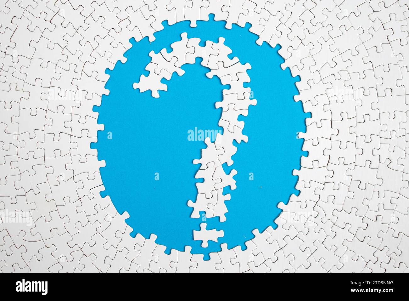 Plain white radial puzzle with a question mark shape made with puzzle ...