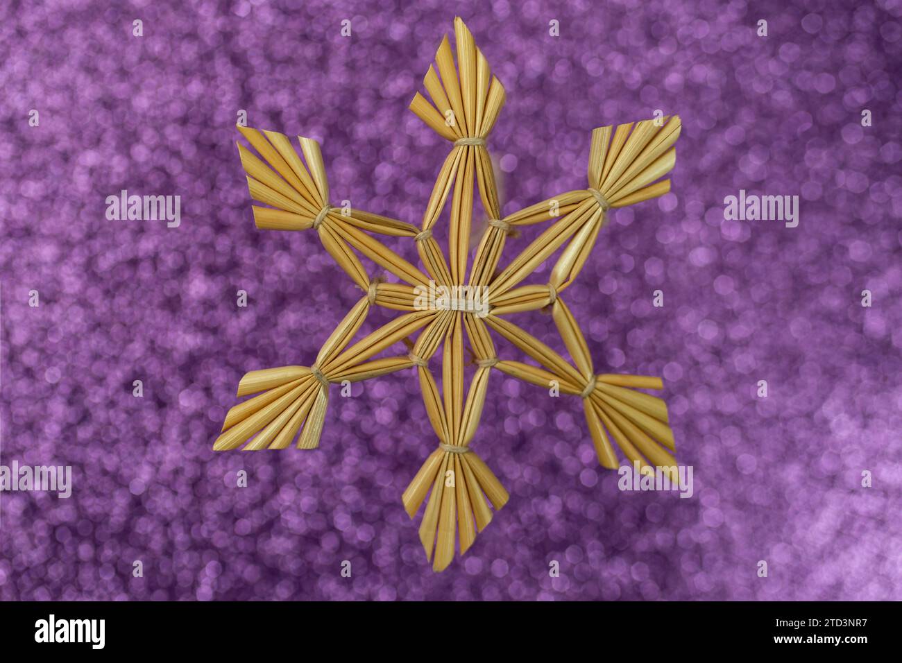 Christmas star snowflake decoration made with golden straws and thread ...