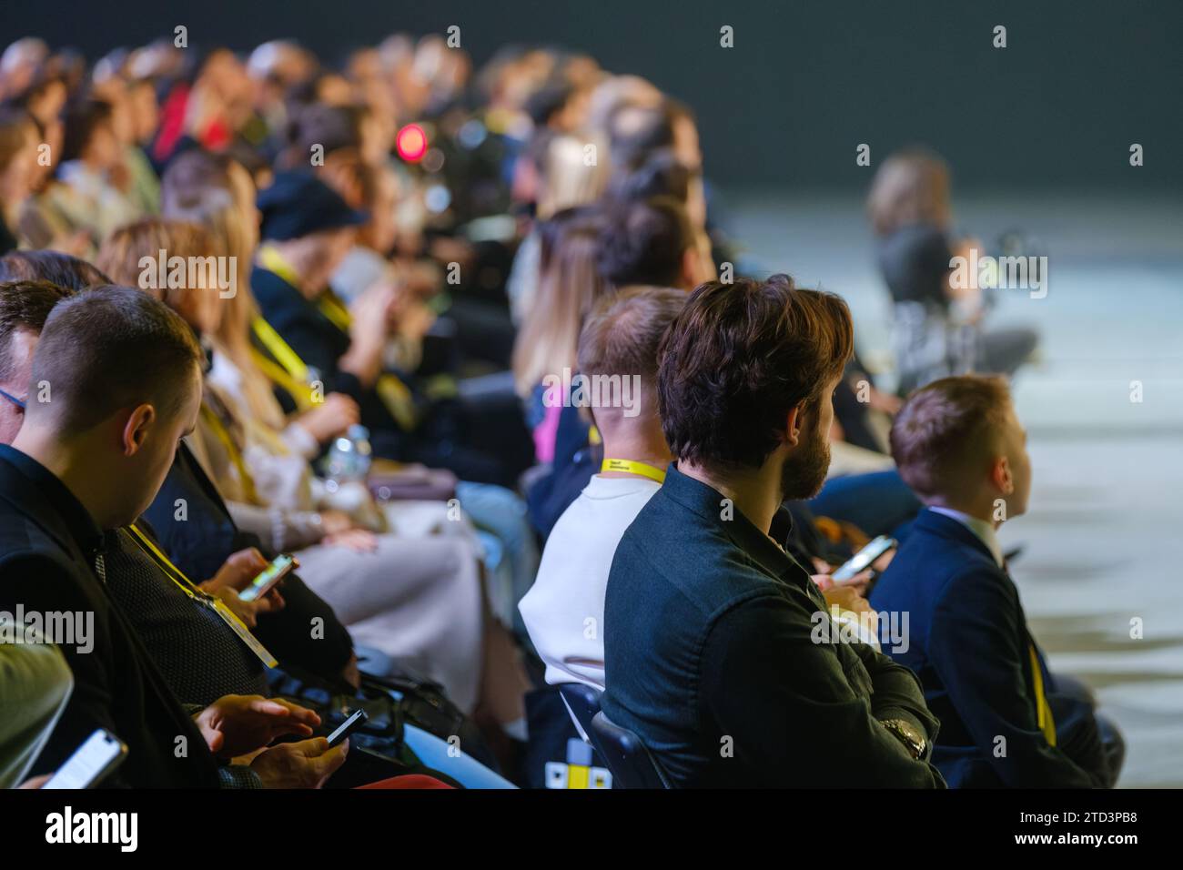 Side view of multiethnic business crowd attending global seminar at ...